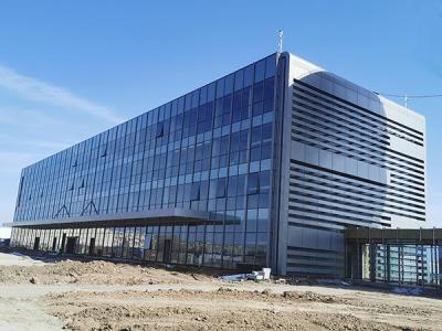 China Steel Structure Prefab Commercial Building with Q235/Q355B H-Section Steel and 688mm Decking Floor for sale