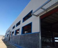 China Custom Steel Structure Workshop Building with Q355 Steel Frame, 1.8-3.0mm Purlin Options for Industrial Use for sale