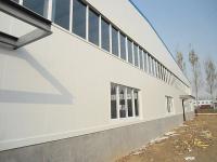 China Custom Steel Warehouse Building with Clear Span Design - Q355/Q235B Steel Frame, 5T-30T Crane Options for sale