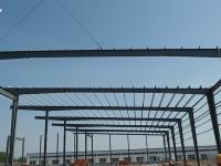 China Q235B Q355B Steel Structure Workshop Building - Custom Industrial Warehouse with 0.3-0.7mm Cladding & 50-200mm Insulation for sale