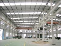 China Welded H Section Steel Prefabricated Building for Custom Warehouse Workshop - Q235/Q355 Materials, Multiple Span Options for sale