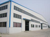 China Q235/Q355 Steel Structure Industrial Building with 2mm Tolerance & Custom Dimensions for Warehouses and Factories for sale