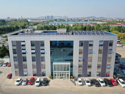 China Prefab Steel Structure Commercial Building - Hot Dip Galvanized or Painted Finish with 5MT-15MT Crane Capacity for sale