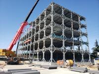 China Prefab Steel Structure Commercial Building - Hot Dip Galvanized or Painted Finish with 5MT-15MT Crane Capacity for sale