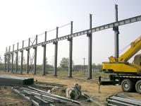 China Custom Steel Structure Factory Building with Q355/Q235 Steel Frame - 5T to 30T Crane Options & Hot-Dip Galvanized Finish for sale