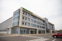 China Prefabricated Steel Frame Commercial Building with 50-Year Lifespan | Q235/Q355B Steel Construction for sale