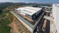 China Custom Prefabricated Steel Structure Building - Q235B/Q355B H-Section Frame for Warehouse & Workshop Construction for sale