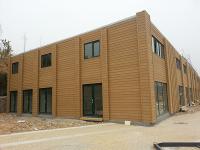 China Painted Commercial Prefabricated Steel Buildings with 688mm Decking and 2mm Structural Tolerance for Warehouses & Offices for sale