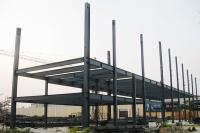 China Q235B Prefab Steel Commercial Building with 50+ Meter Clear Span and Hot-Dip Galvanized Finish for sale
