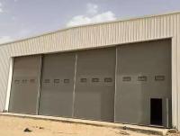 China Custom Steel Structure Aircraft Hangar with Q235/Q355B H-Section Steel and Multiple Cladding Options for Large-Span Storage for sale