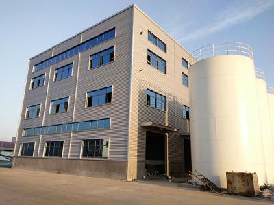 China Q355B Prefabricated Steel Buildings - Custom Multi-Story Commercial Structures with 688mm Decking for sale