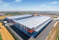 China Prefabricated Steel Structure Industrial Building with Q355 H-Section Steel and M24 Anchor Bolts for Factories & Warehouses for sale
