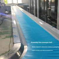 China Stainless Steel Heavy Duty Slat Conveyor Line Industrial Chain Slat Conveyor for sale