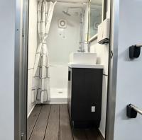 China Luxury 2-Stall Mobile Restroom Trailer Portable Toilet with AC Fiberglass Body Tandem Axle for sale