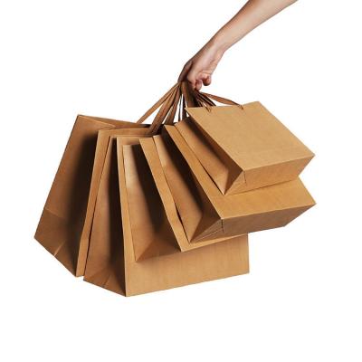 China Industrial Surface Packaging Custom Logo Print Wholesale Grocery White Brown Kraft Paper Gift Bag with Handle for sale