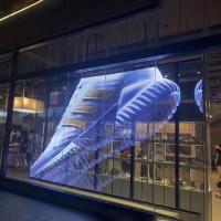 China Fixed Advertising LED Display Panel P3.91 P7.8 Transparent LED Mesh Screen for Store Curtain for sale