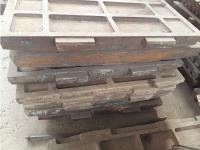 China Fixed And Movable Casting Jaw Crusher Plate High Manganese Crusher Spare Parts for sale