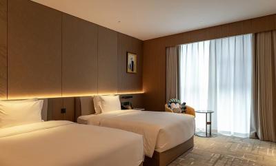 China Minimalist Hotel Guest Room Furniture Eco Friendly Hotel Room Furniture Sets Customized for sale