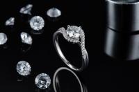 China Simple Arrival S925 Bright Setting Women Infinity Round Cut Moissanite Ribbon Twist Wedding Engagement Ring for sale
