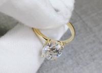 China 1.5ct Oval Cut Lab Grown Moissanite Ring 14K Gold Material 0.7×0.9cm size for sale