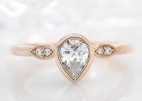 China 0.77carat 10k Gold Moissanite Ring , Gold Solitaire Engagement Ring 5×7mm Dimension for sale