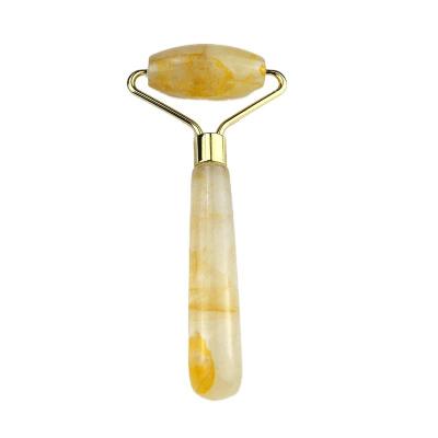 China 128*58mm Yellow Citrine Roller Real Natural Stone Facial Massager Ice Face Roller Welded Smooth Massage Area for sale