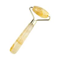 China 128*58mm Yellow Citrine Roller Real Natural Stone Facial Massager Ice Face Roller Welded Smooth Massage Area for sale