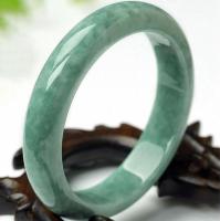 China Natural Dark Green Jade Bracelet a Timeless Piece of Jewelry for Your Collection for sale