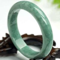 China Natural Dark Green Jade Bracelet a Timeless Piece of Jewelry for Your Collection for sale