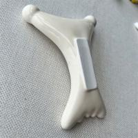 China OEM/ODM X Shaped Ceramic Gua Sha Scraping Massager Beauty Salon Essential for Facial Relaxation for sale