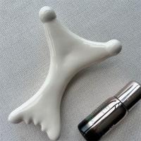 China OEM/ODM X Shaped Ceramic Gua Sha Scraping Massager Beauty Salon Essential for Facial Relaxation for sale