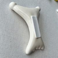 China OEM/ODM X Shaped Ceramic Gua Sha Scraping Massager Beauty Salon Essential for Facial Relaxation for sale