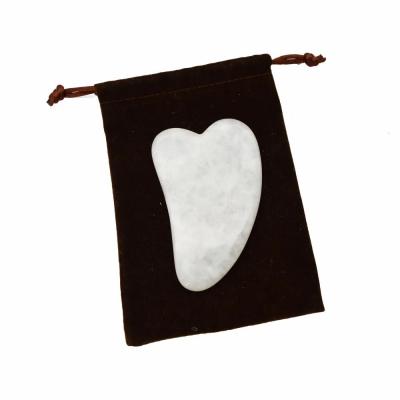 China Hand-Held Gua Sha Tool Made of White Jade for Effective Muscle Massage and Beauty Care for sale