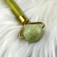 China Xiuyan Jade Skin Care Jade Stone Facial Eye Therapy Skin Tightening Spa Wrinkle Remover Massager Face Roller With Flower Handle for sale