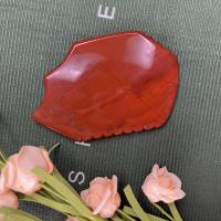 China Red Jasper Facial Guasha Skin Lifting Firming Natural Hand Healing Jade Gua Sha Facial Massage Tool Portable and Handheld for sale