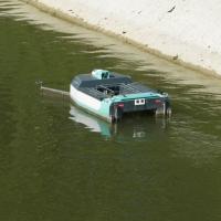China Surface Unmanned River Cleaning Boat With Flexible Extension Arm for sale