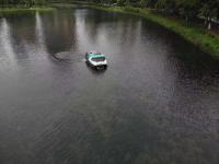 China Driverless TITAN Pond Water Grass Harvester USV Boat For Aquatic Plant Mowing 800mm Depth for sale