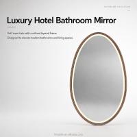 China Kingstin LED Smart Bathroom Mirror Water Drop Oval Makeup Mirror Aluminum Frame Touch Anti-Fog Wall Mirror for sale