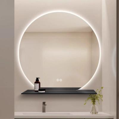China Modern Round LED Bathroom Mirror Storage Shelf Integrated Touch Switch IP44 Rated for Hotels Apartments Compact Toilets Vanities for sale