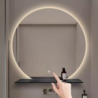 China Modern Round LED Bathroom Mirror Storage Shelf Integrated Touch Switch IP44 Rated for Hotels Apartments Compact Toilets Vanities for sale