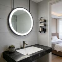 China Modern LED Backlit Round Bathroom Mirror with Hanging Design - Black Frame Illuminated Vanity Mirror for Hotel/Home for sale