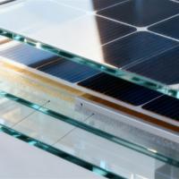 China Low Iron Solar Glass tempered glass with superior light transmittance and packaging prepared for secure container loading for sale