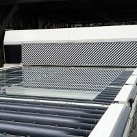 China Low Iron Solar Glass tempered glass with superior light transmittance and packaging prepared for secure container loading for sale