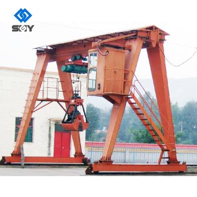 China Industrial Shore EOT Double Girder Gantry Crane With Grab Bucket for sale