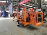 China 100kg -1000kg Trailer Mounted Access Platform Articulating Boom Lift for sale