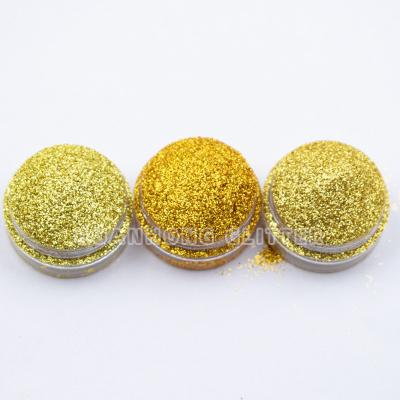 China Golden Glitter Powder 0.2mm-2.0mm Hexagon PET Cosmetic Grade for Nail Art and DIY Makeup for sale
