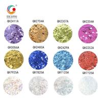 China Solvent Resistant PET Glitter Powder 50 Microns - Gold Red Iridescent in Hexagon 3.0mm and Multiple Shapes for Crafts for sale