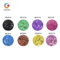 China Solvent Resistant PET Glitter Powder 50 Microns - Gold Red Iridescent in Hexagon 3.0mm and Multiple Shapes for Crafts for sale