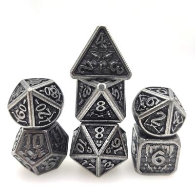 China Waterproof Sharp Edged Metal RPG Dice Set 7 Piece Practical Sturdy Polyhedral Black And White Color for sale