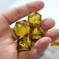 China Yellow Flow Sand Resin Polyhedral Dice Handcraft 7PCS for sale
